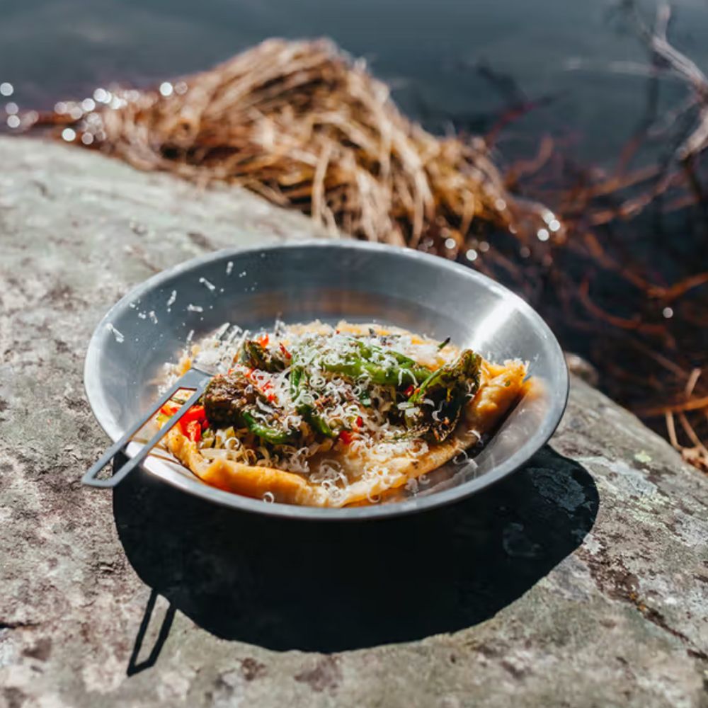 Open faced omelette with a padrón pepper salad and grated parmesan